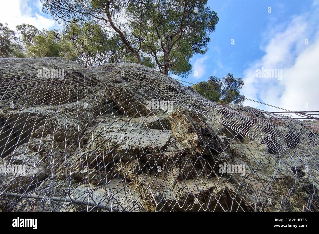 Steel net at slope hill for road protection hi-res stock photography ...
