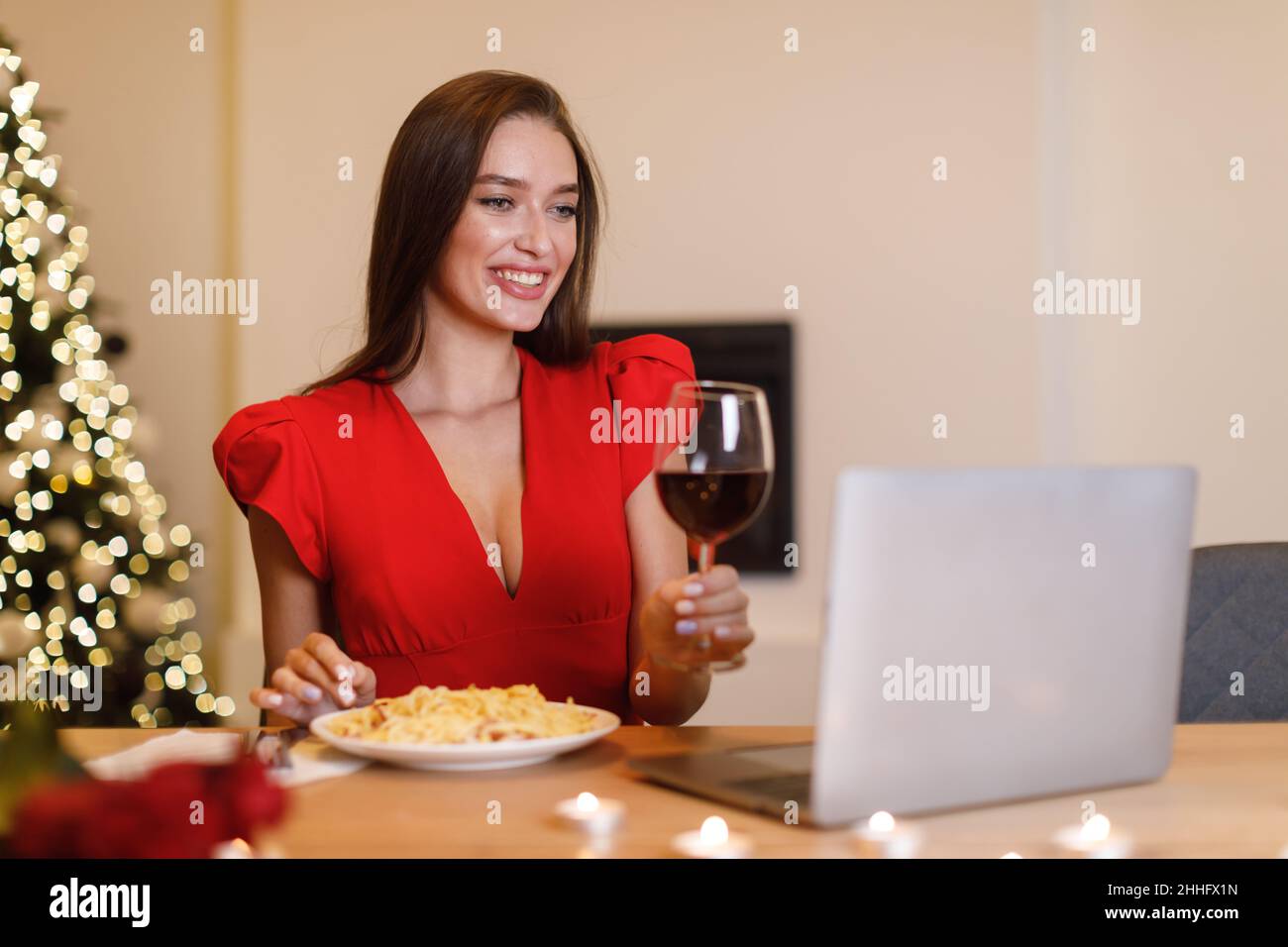 Excited woman having dinner hi-res stock photography and images - Alamy