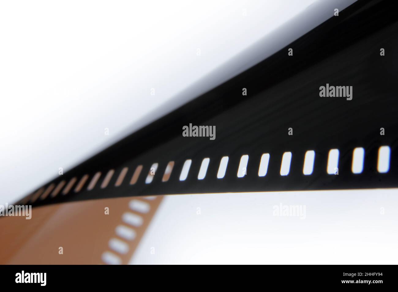 Old 35 mm film strip on a white background Stock Photo - Alamy