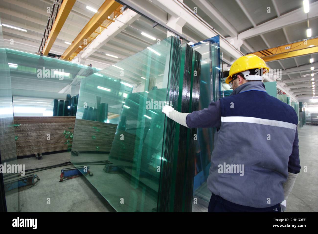 Glass manufacturing factory. Workers in the factory Stock Photo - Alamy
