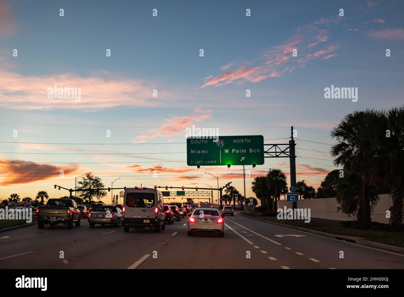 Road sign at sunset hi-res stock photography and images - Alamy