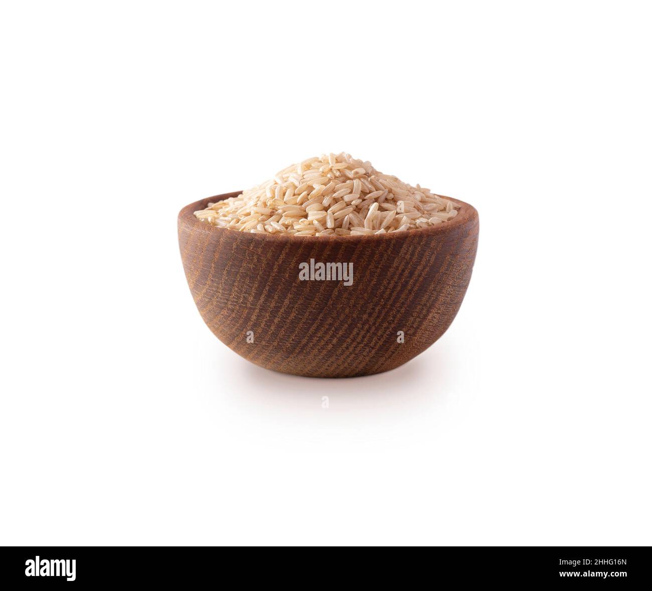 Bowl with brown rice isolated on white background. Close-up. Grain rice ...