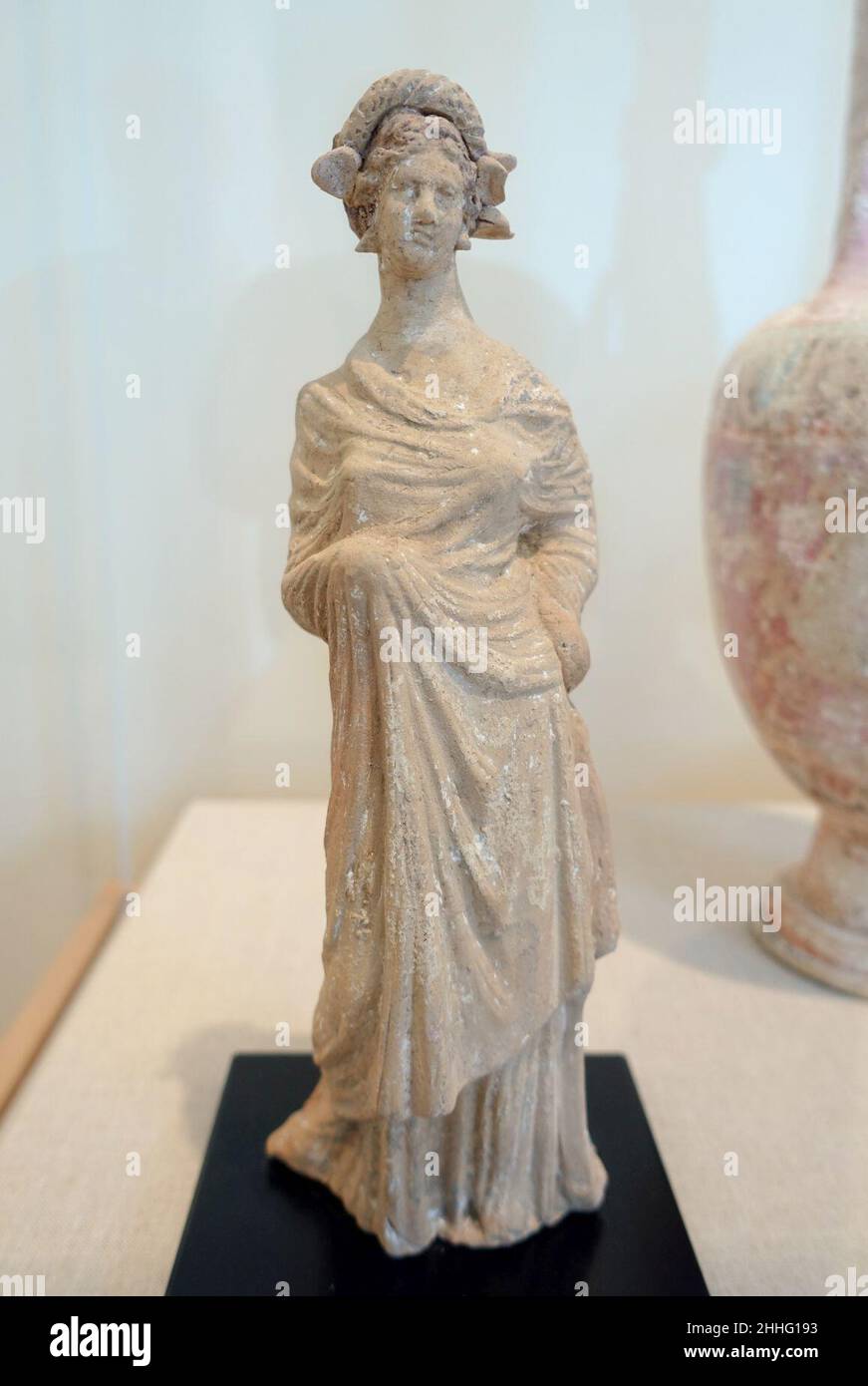 Statuette (Tanagra figurine), Greek, 3rd century BC, molded terracotta ...