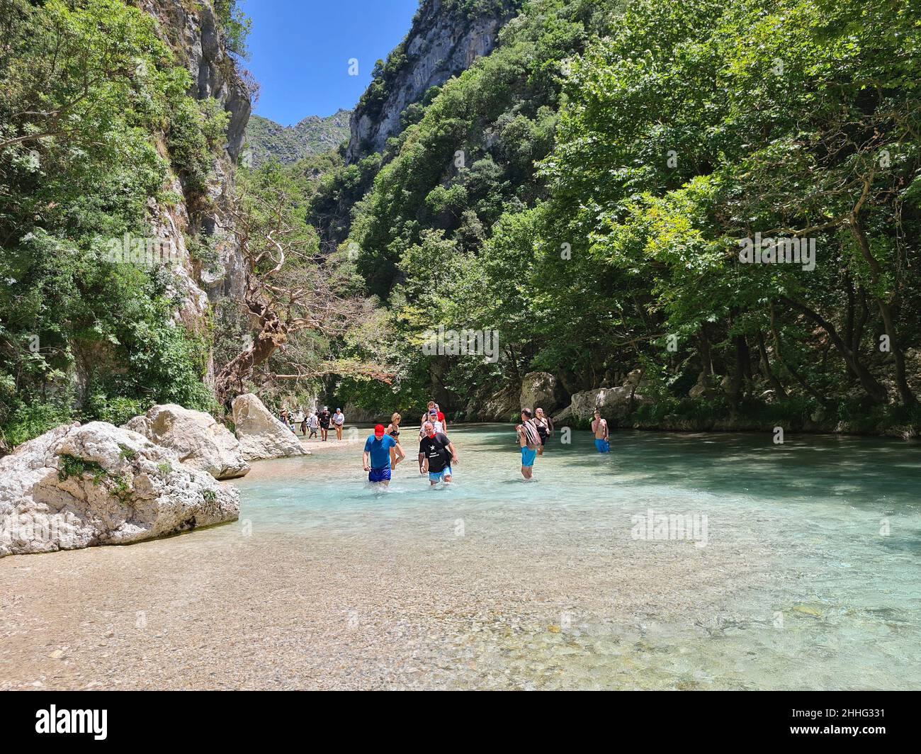 Glyki, Greece - June 29, 2021: Unknown tourists in the clear but cold ...