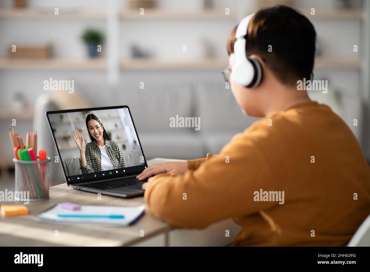 Cute teenager boy having video hi-res stock photography and images - Alamy