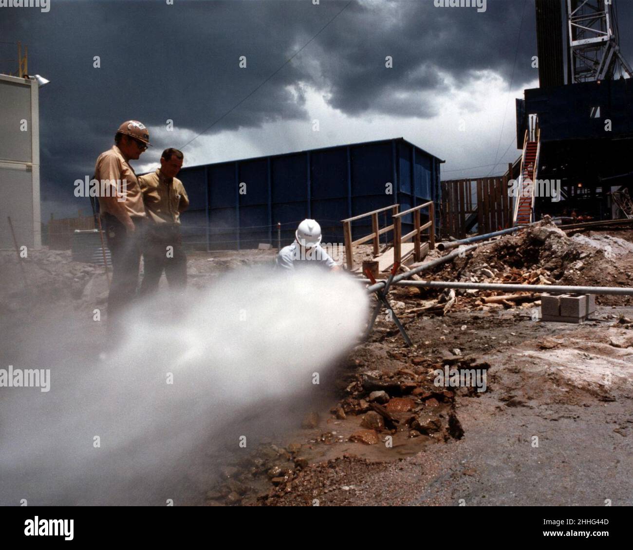 Steam release and pressure check from experiment hole Stock Photo - Alamy
