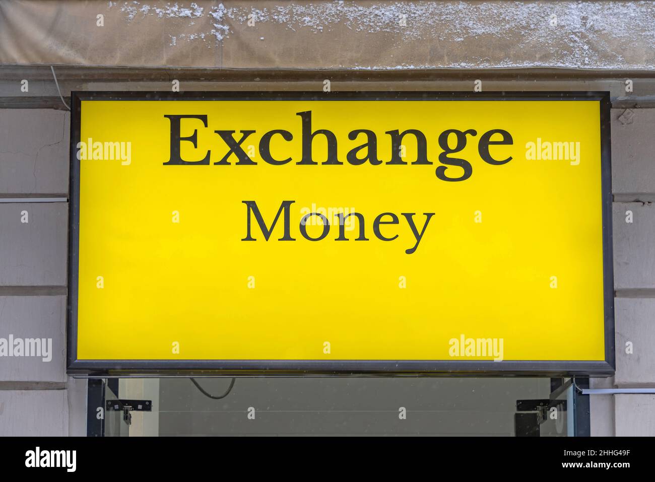 Big Yellow Illuminated Sign Exchange Money Office Stock Photo - Alamy