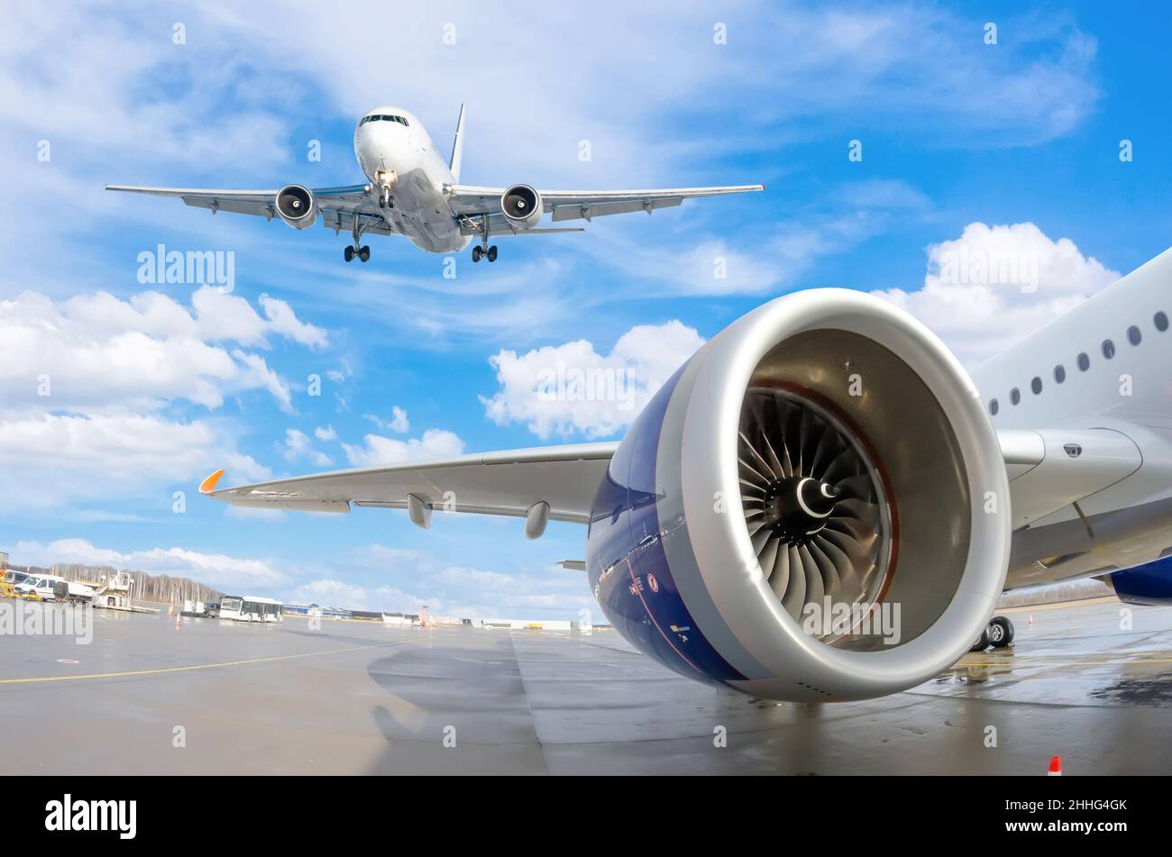 View of the wing and engine of a passenger aircraft and a landing ...