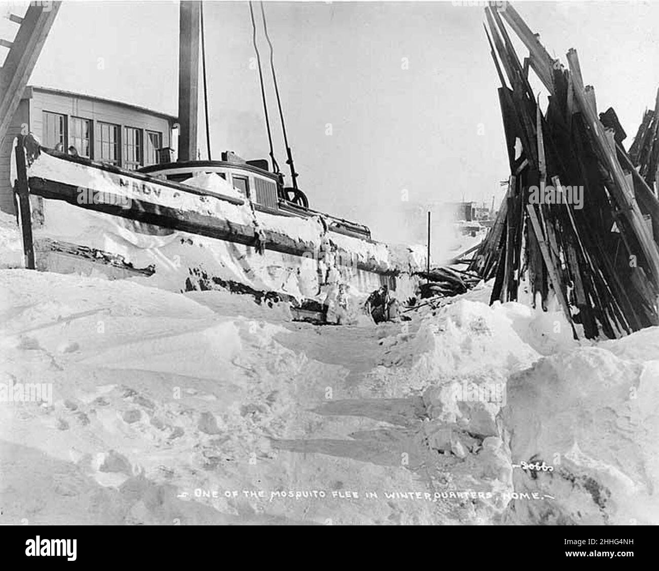 Steamer covered in snow and ice locked in for the winter, Nome, Alaska ...