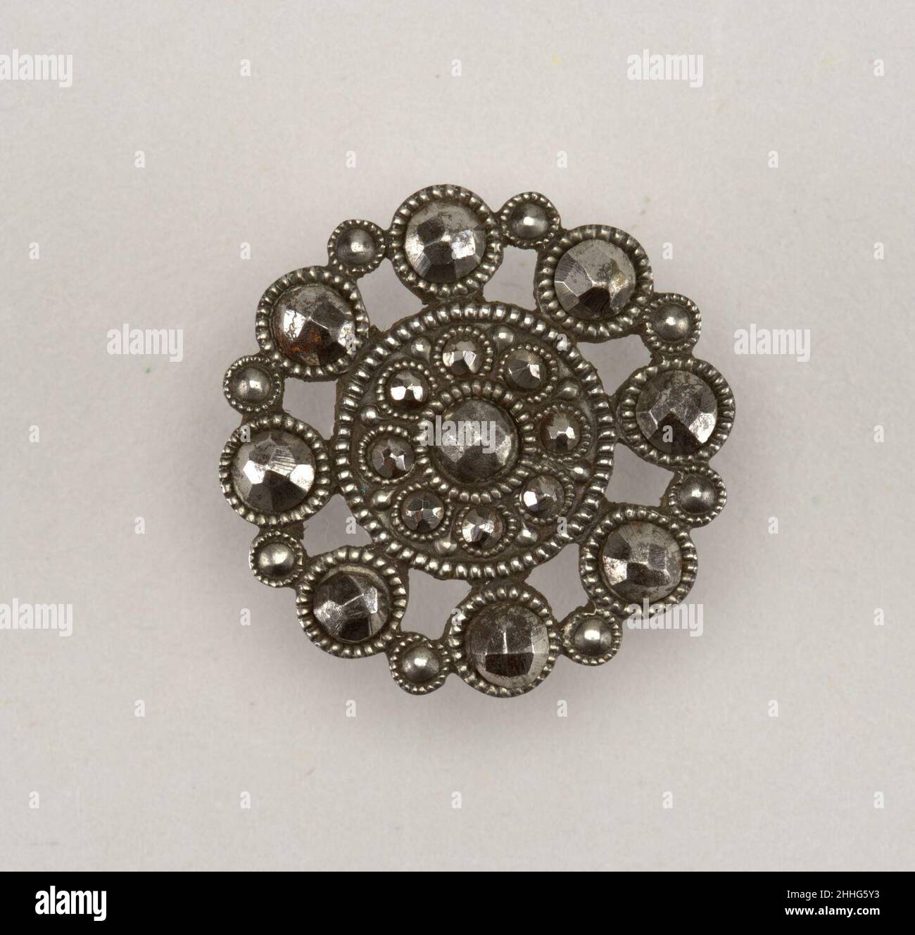 Steel button Button, 19th century Stock Photo - Alamy