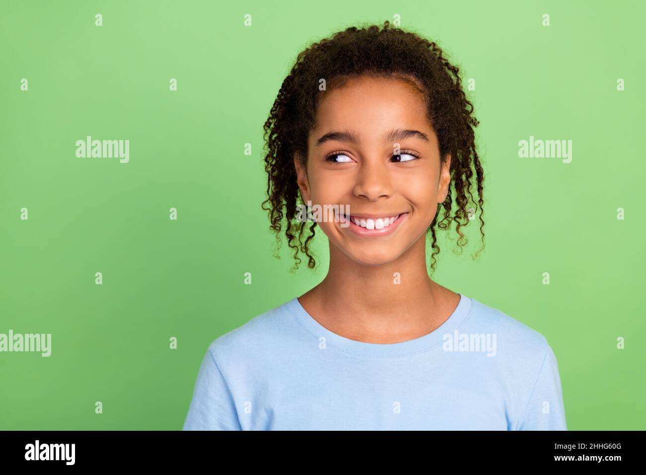 Photo of young afro preteen girl child curious interested look empty ...