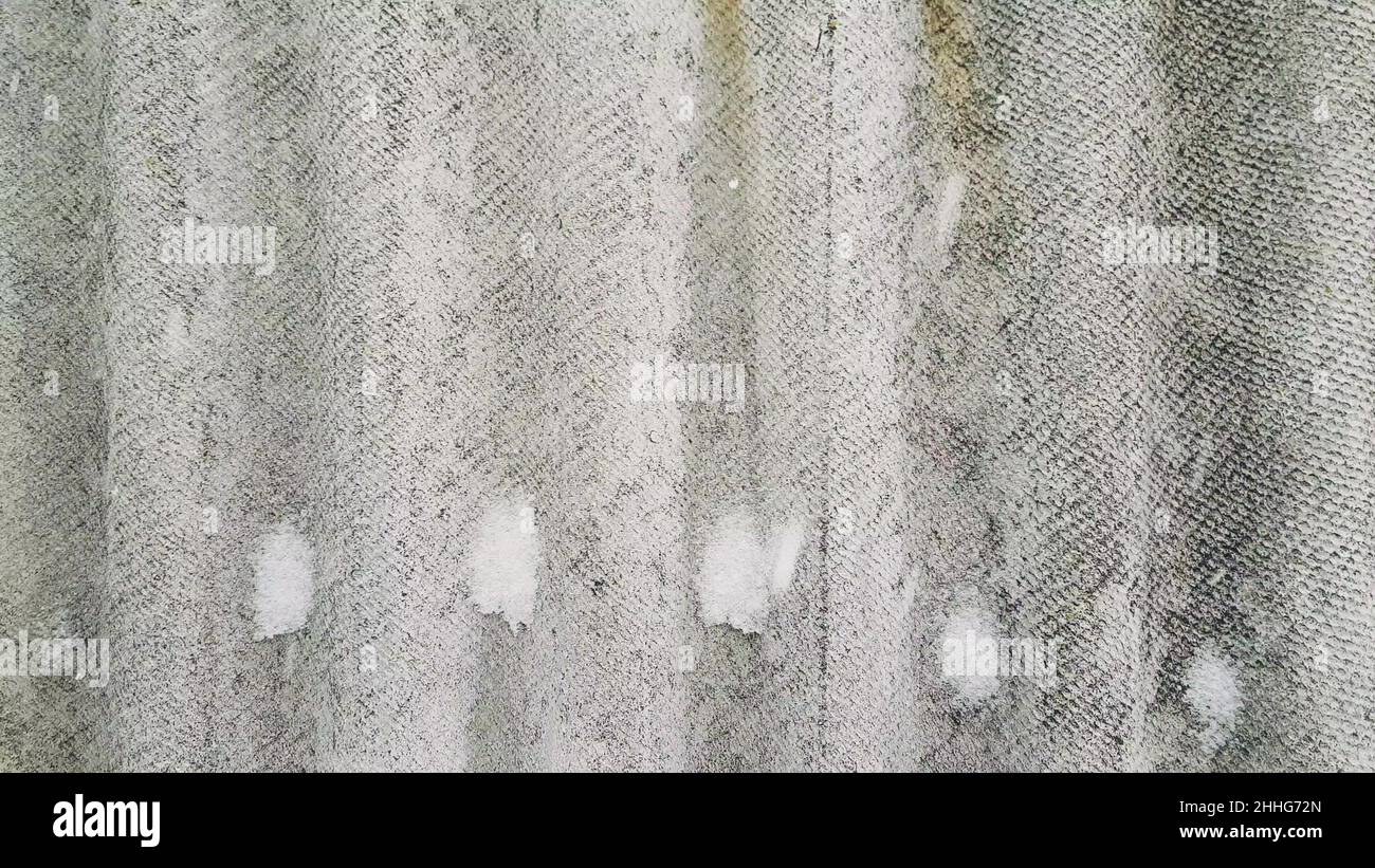 Grey slate asbestos cement sheet with snow Stock Photo - Alamy