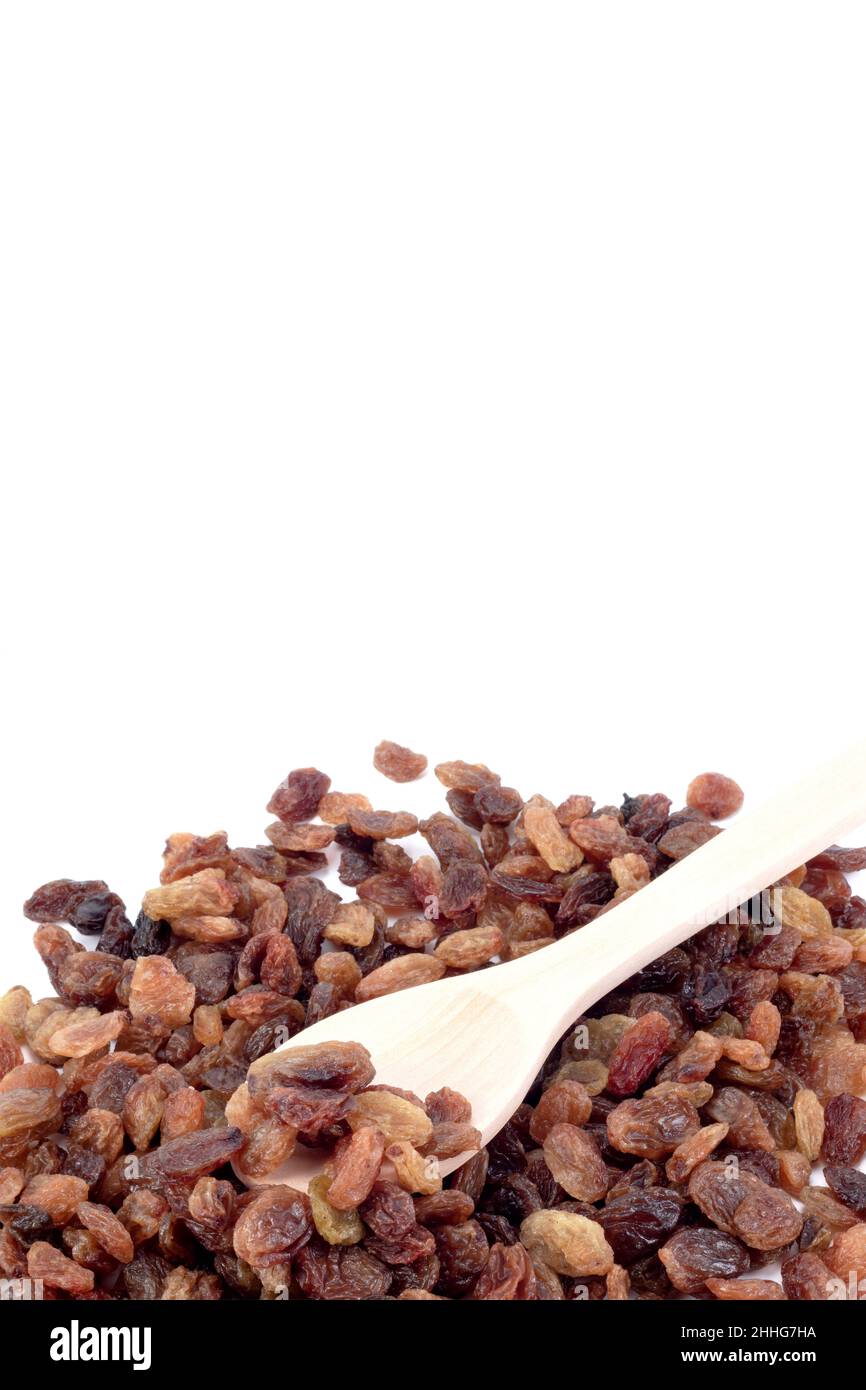 Dried grapes, raisins on a white background. Banner, place for text ...