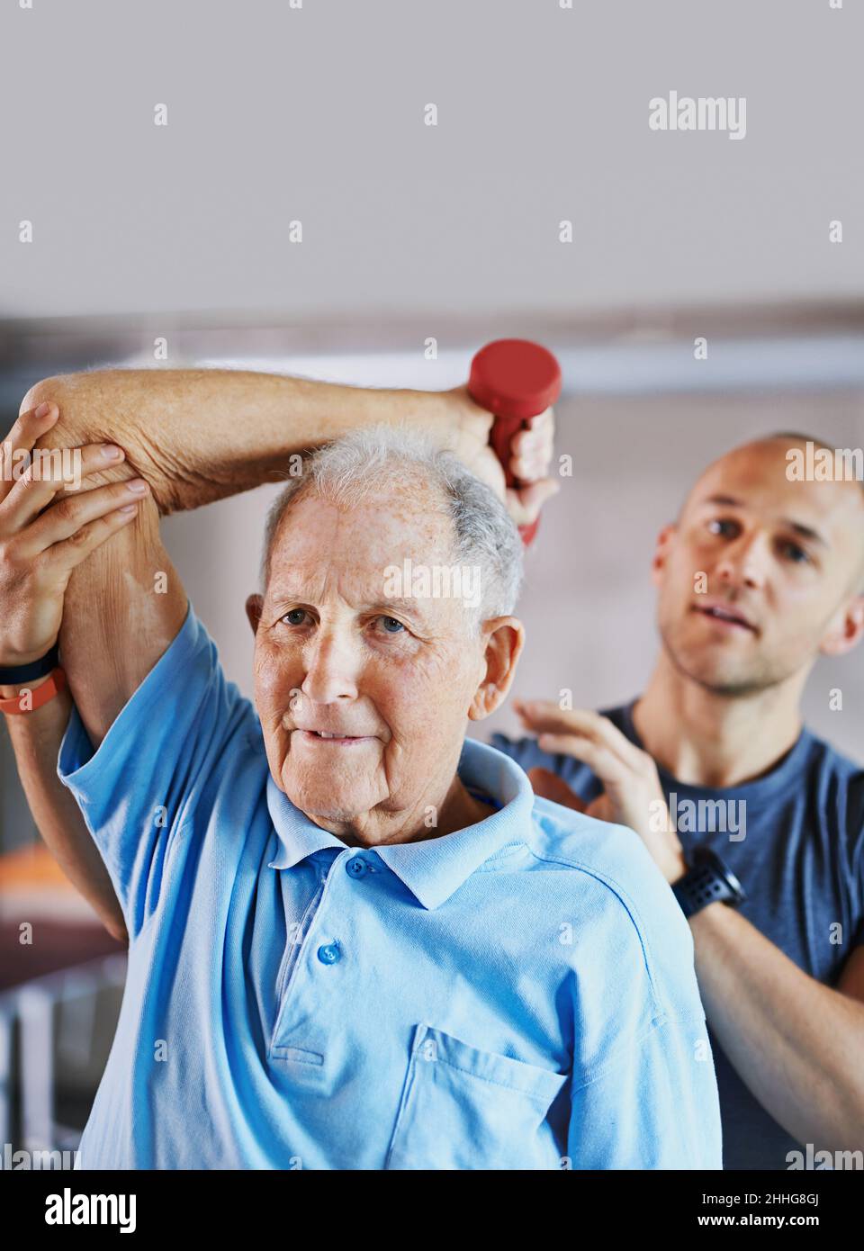 Fit for life. Shot of a senior man working out with the help of a ...