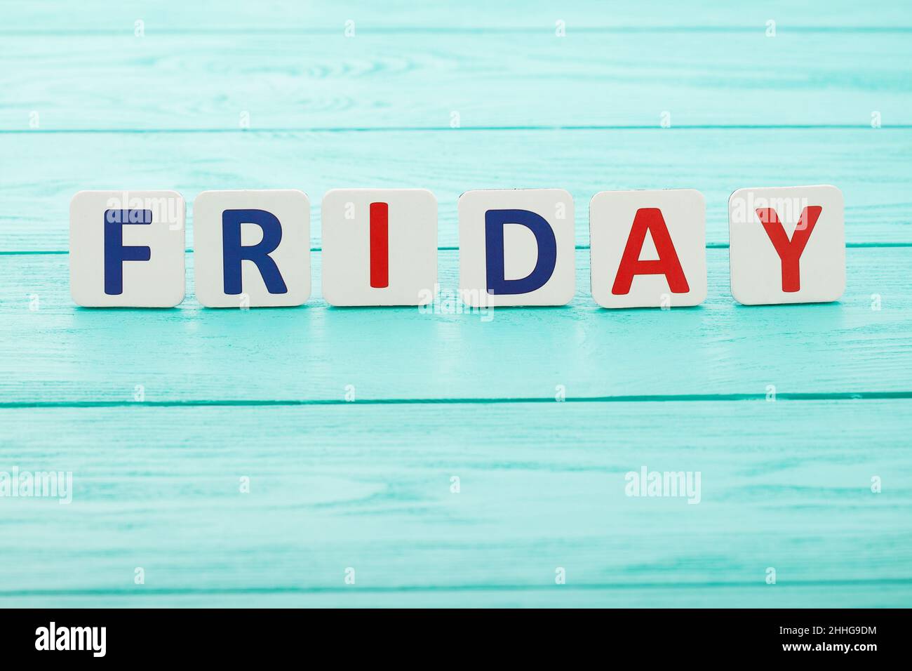 word friday letters on blue wooden background. Black friday sales. Top ...