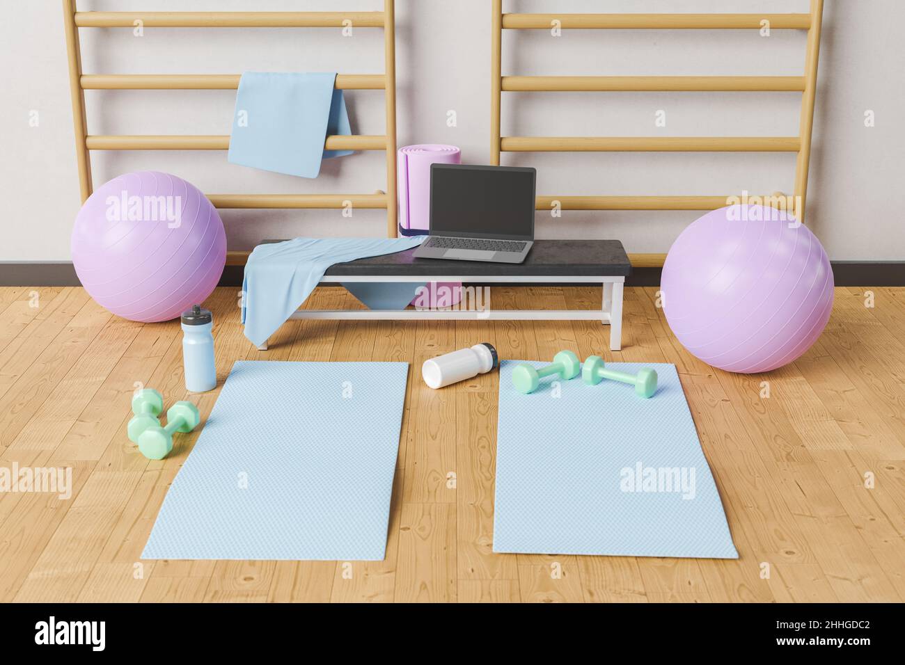 gym with exercise equipment and laptop on top of a bench. concept of ...