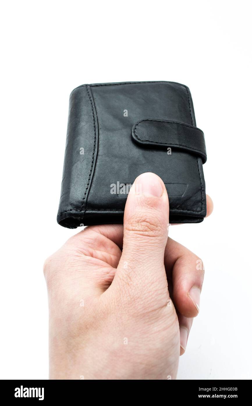 Wallet in hand at isolated white background Stock Photo - Alamy