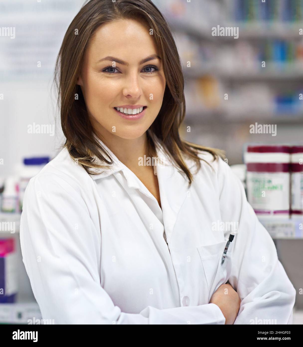 Your friendly local pharmacist. Portrait of an attractive young ...