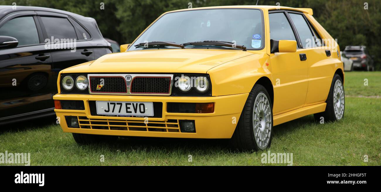 A Yellow Lancia Delta Integrale Evo Stock Photo - Alamy