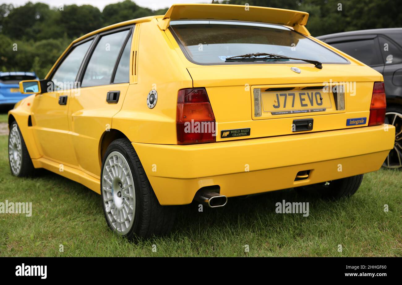 A Yellow Lancia Delta Integrale Evo Stock Photo - Alamy