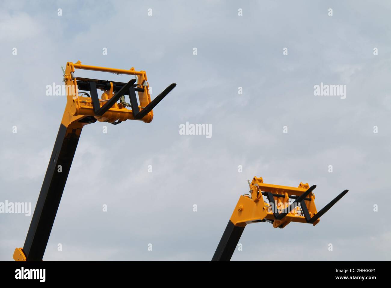 A Pair of Industrial Long Reach Fork Lift Trucks Stock Photo - Alamy