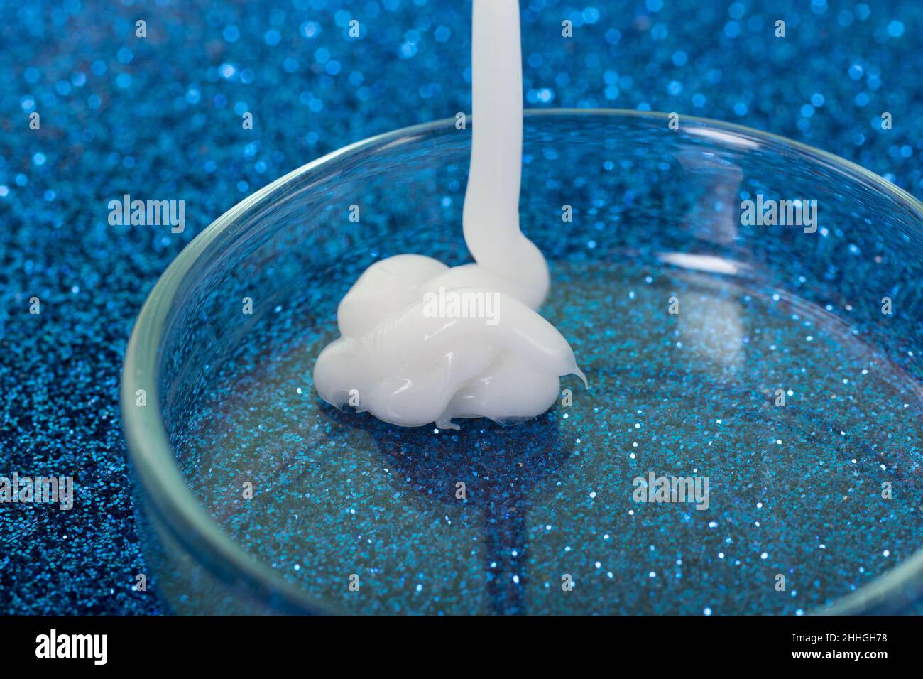 Closeup photography of white cream dripping in petri dish Stock Photo ...