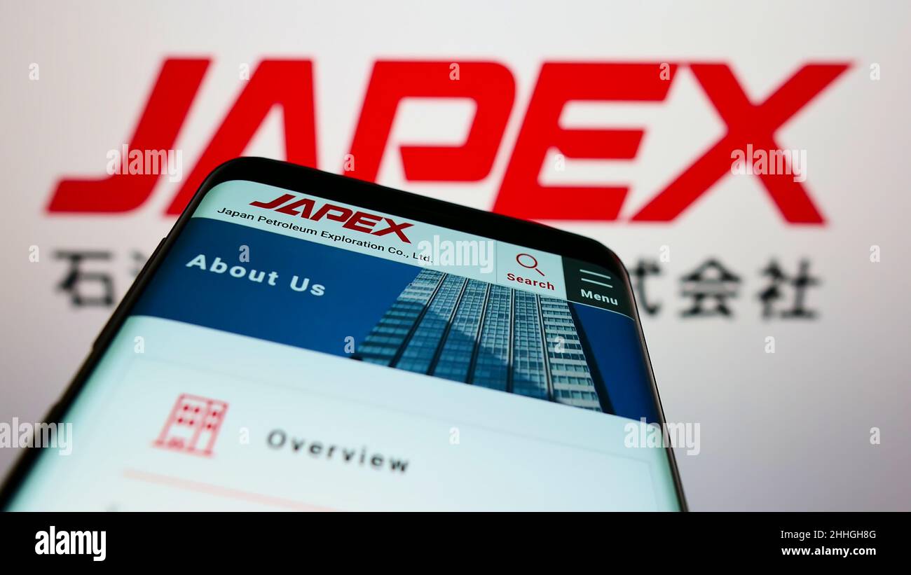 Mobile phone with website of Japan Petroleum Exploration Company ...