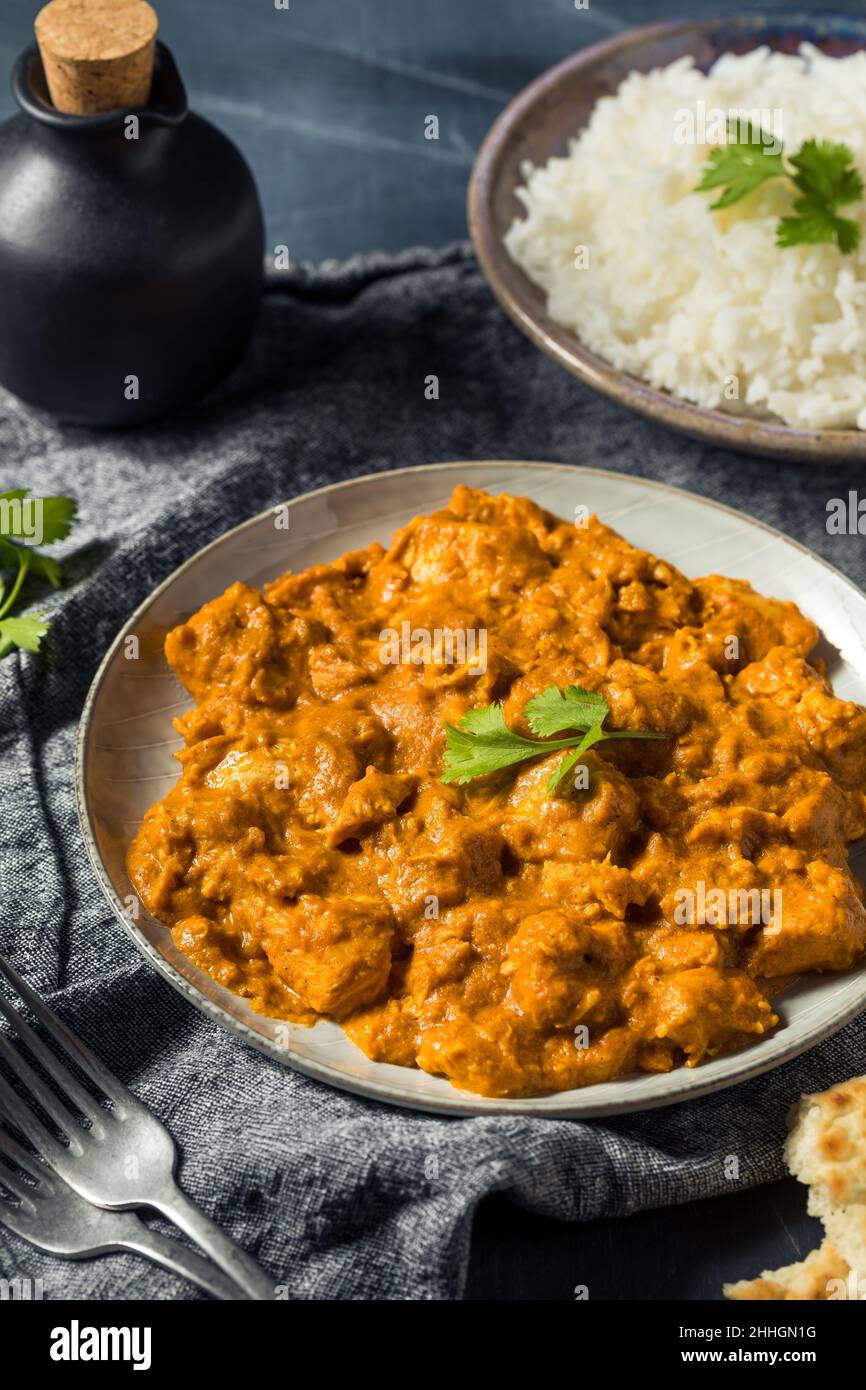Homemade Indian Coconut Chicken Curry with Rice and Naan Bread Stock ...