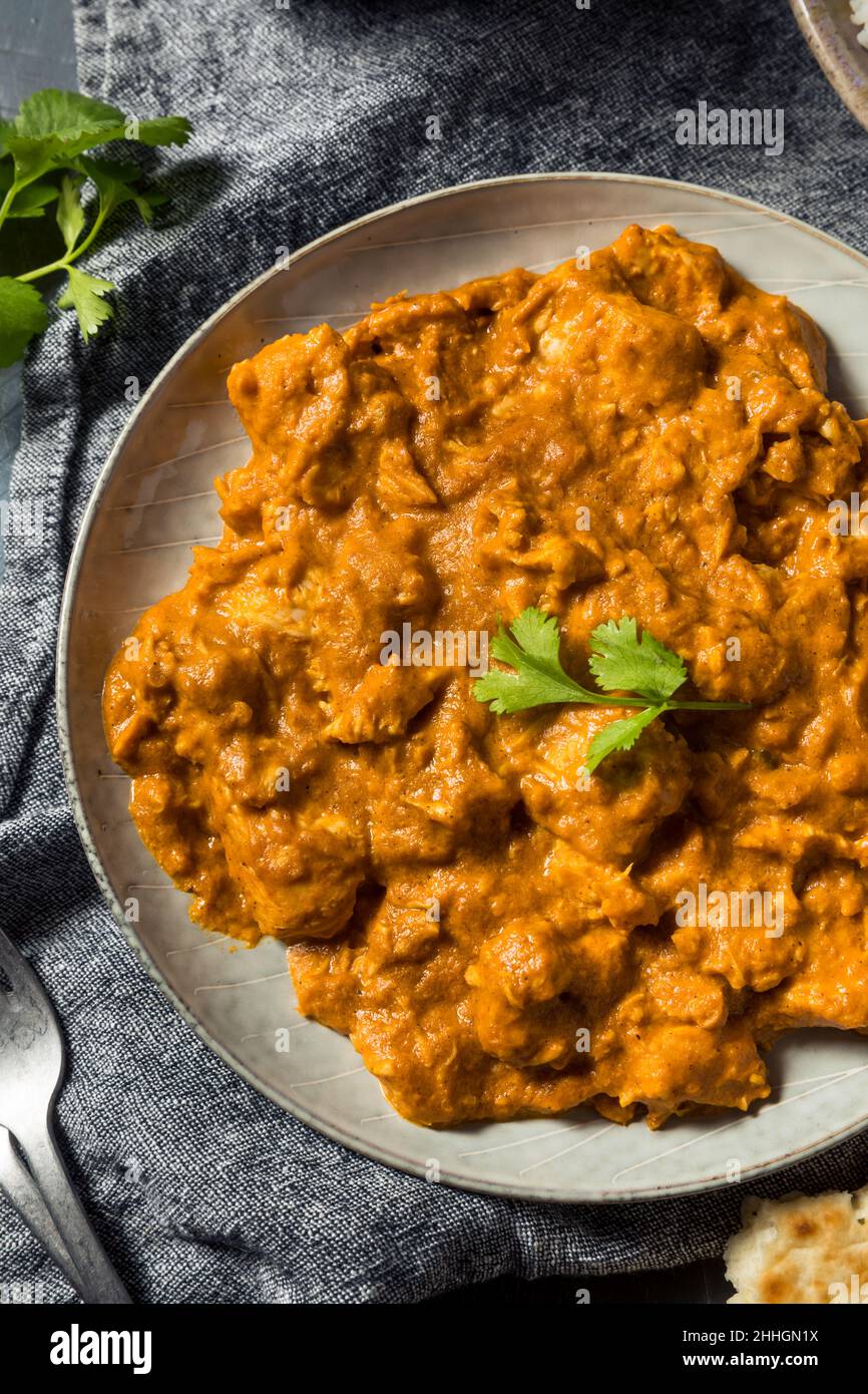 Homemade Indian Coconut Chicken Curry with Rice and Naan Bread Stock ...