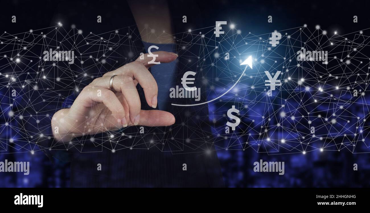 Global currency exchange concept Hand hold digital hologram virtual ...