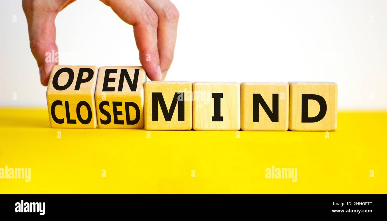 Open or closed mind symbol. Businessman turns cubes and changes concept ...