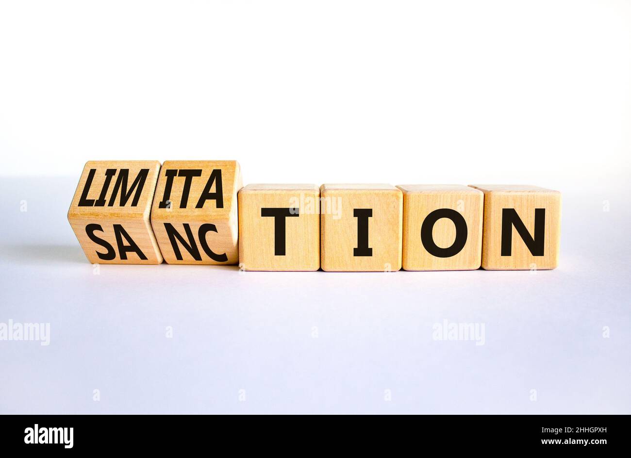 Sanction and limitation symbol. Turned wooden cubes and changed the ...
