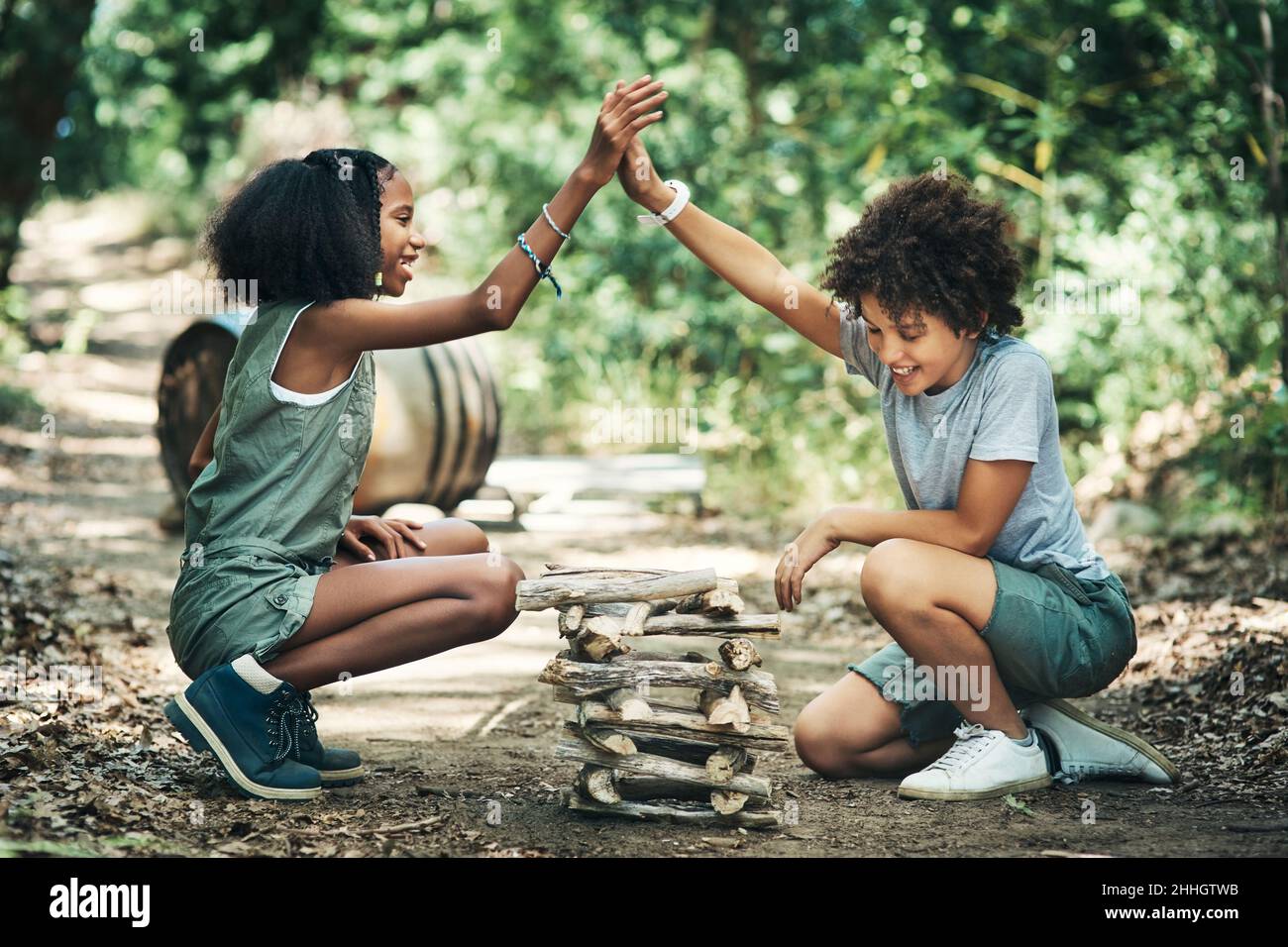 Teamwork makes the friendship work. Shot of a teenage boy and girl ...
