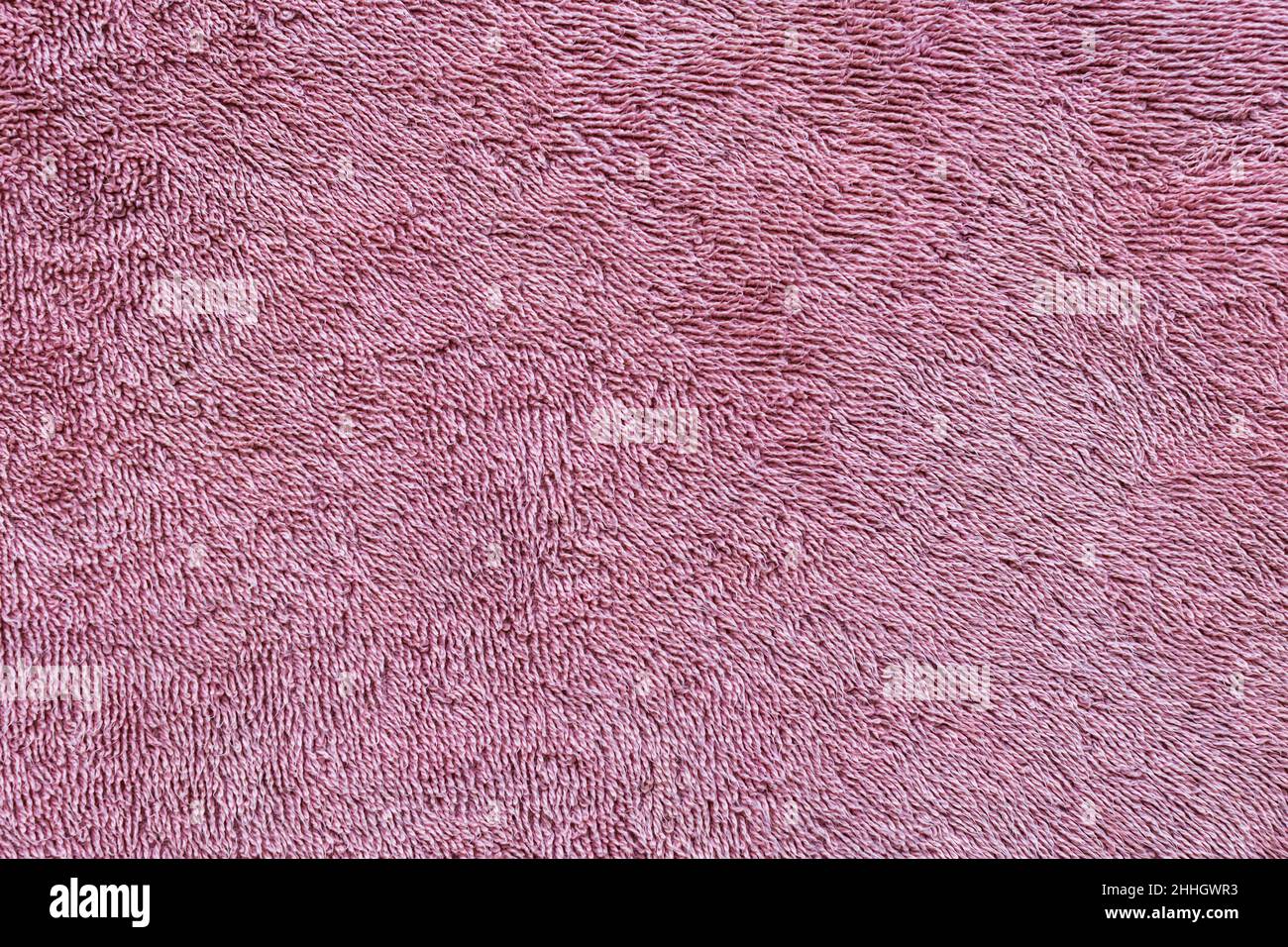 background in the form of a fleecy surface of light burgundy color ...