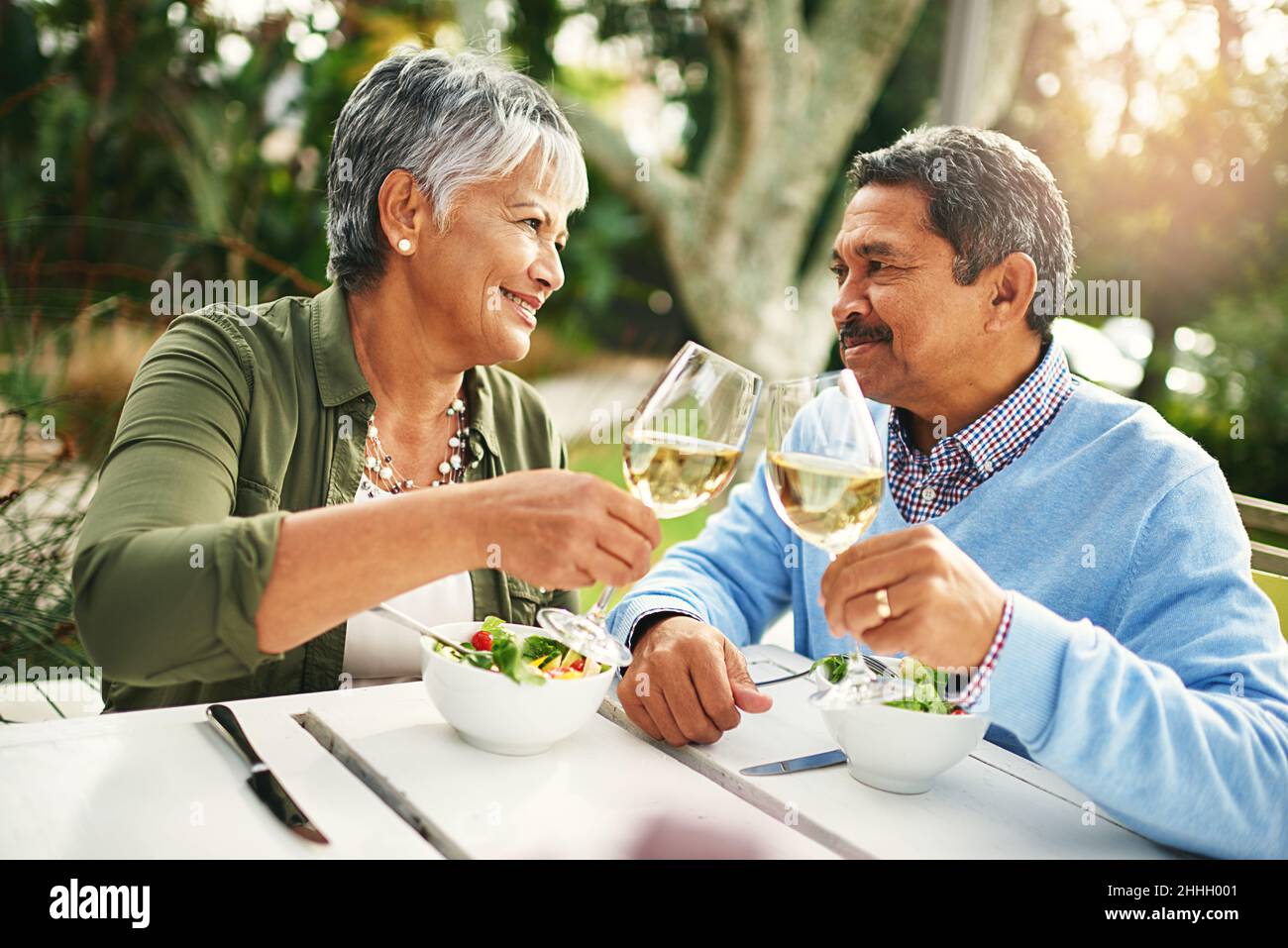 Raise your glass to a relaxing retirement Stock Photo - Alamy
