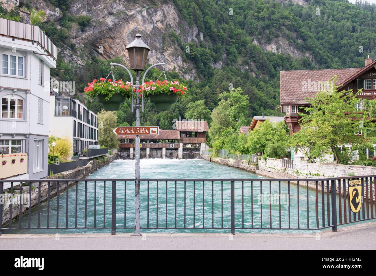 Road Signs in Interlaken with a beautiful mountain background view and ...