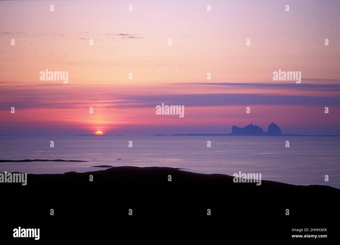 Sunset, nightfall in spring over the Norwegian Sea in 1991, analog ...