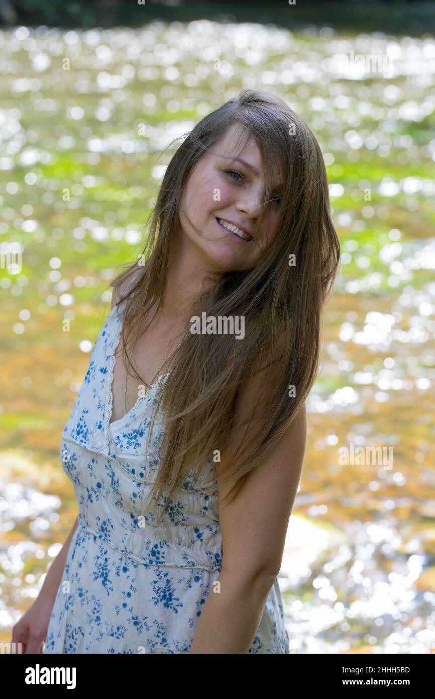 beautiful young woman in river Stock Photo - Alamy