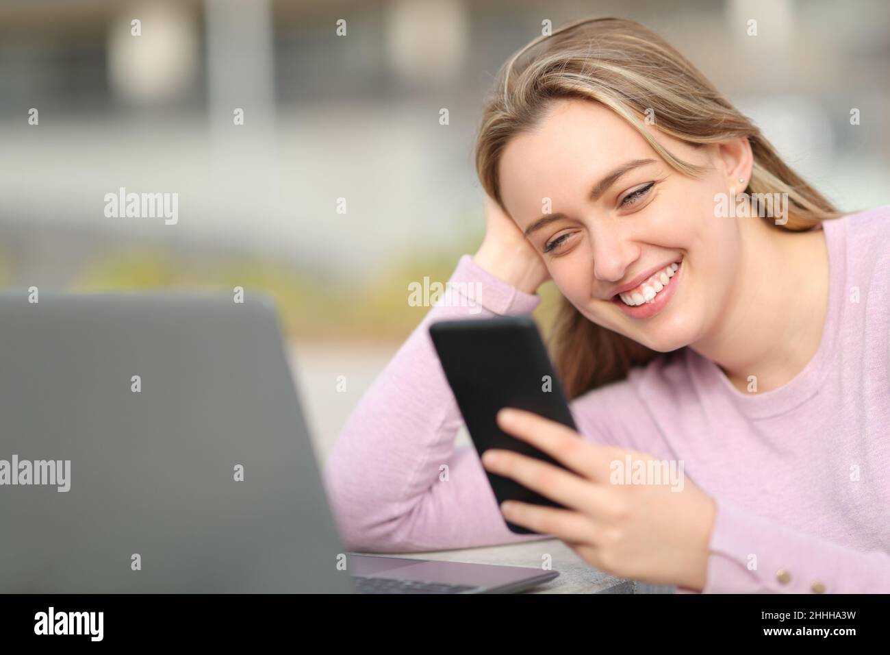 Teen watching tv laptop phone hi-res stock photography and images - Alamy