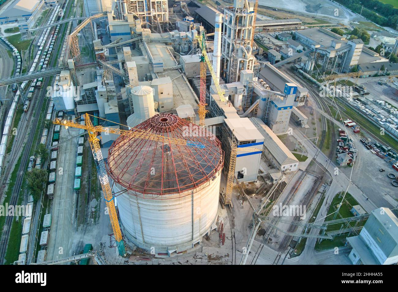 Aerial view of cement factory under construction with high concrete ...