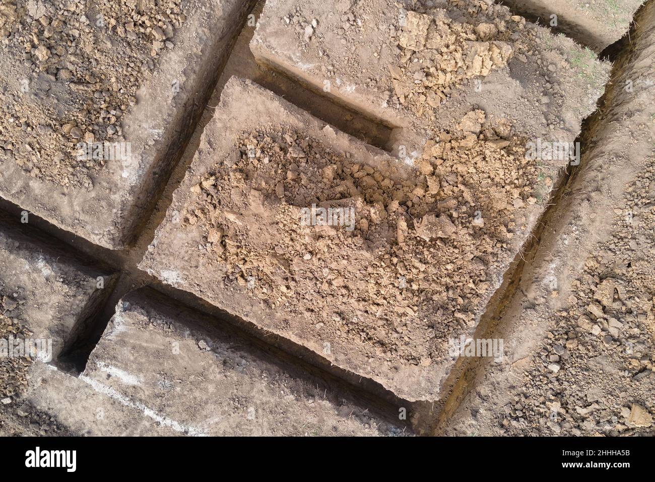 Dug out trench for building works of new house concrete foundation on ...