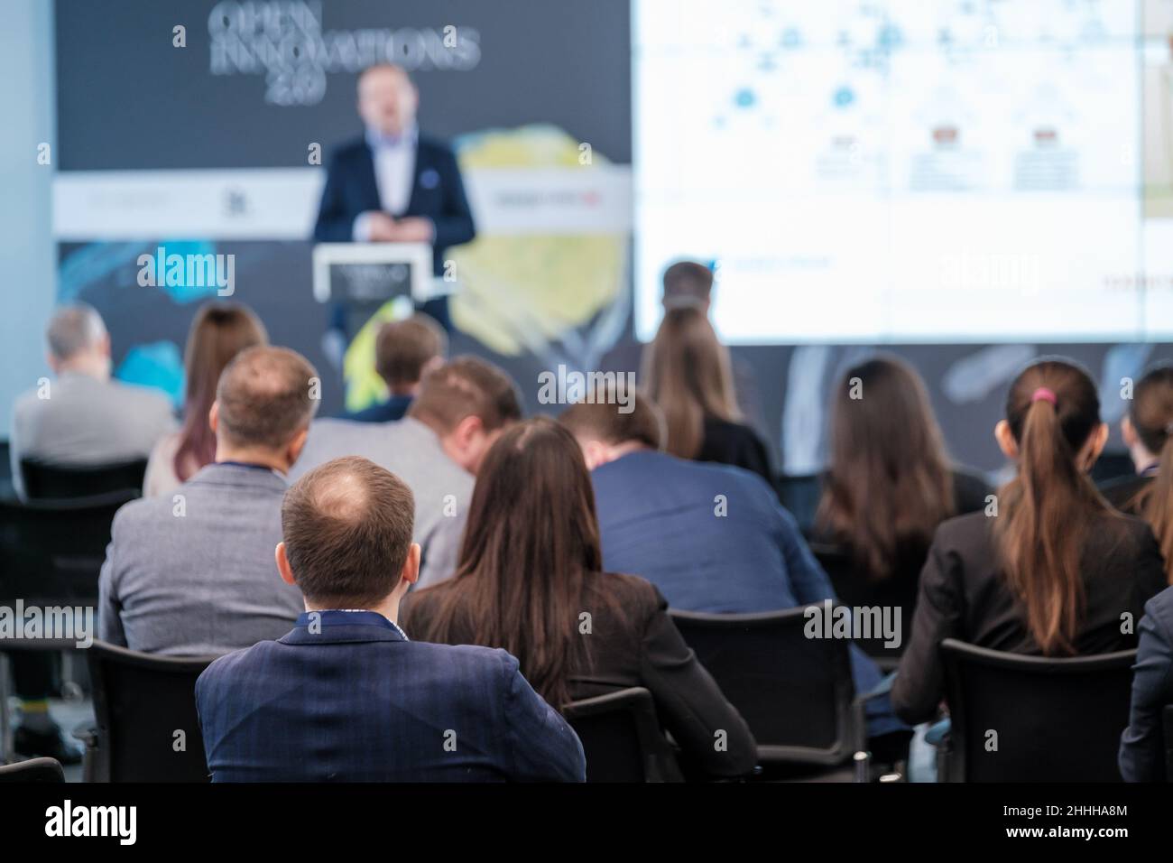 Audience watching presentation during business seminar Stock Photo - Alamy