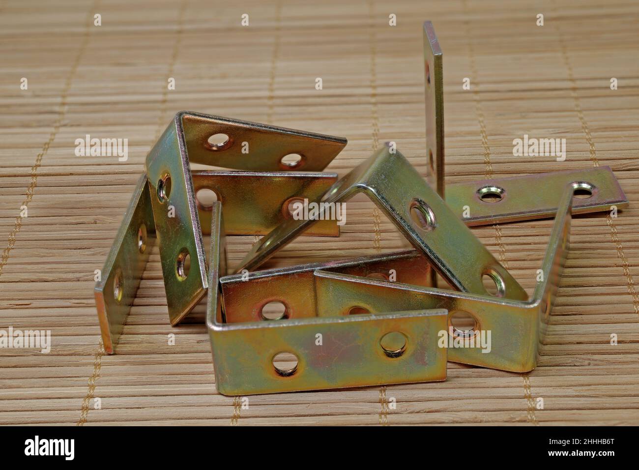 Wooden connector, metal angle in a close-up Stock Photo - Alamy