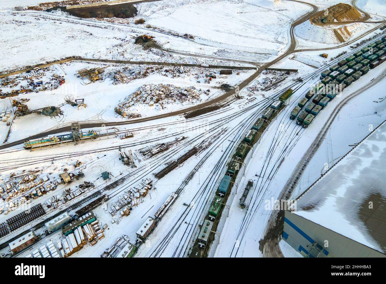 Aerial view of cargo train loaded with crushed stone materials at ...