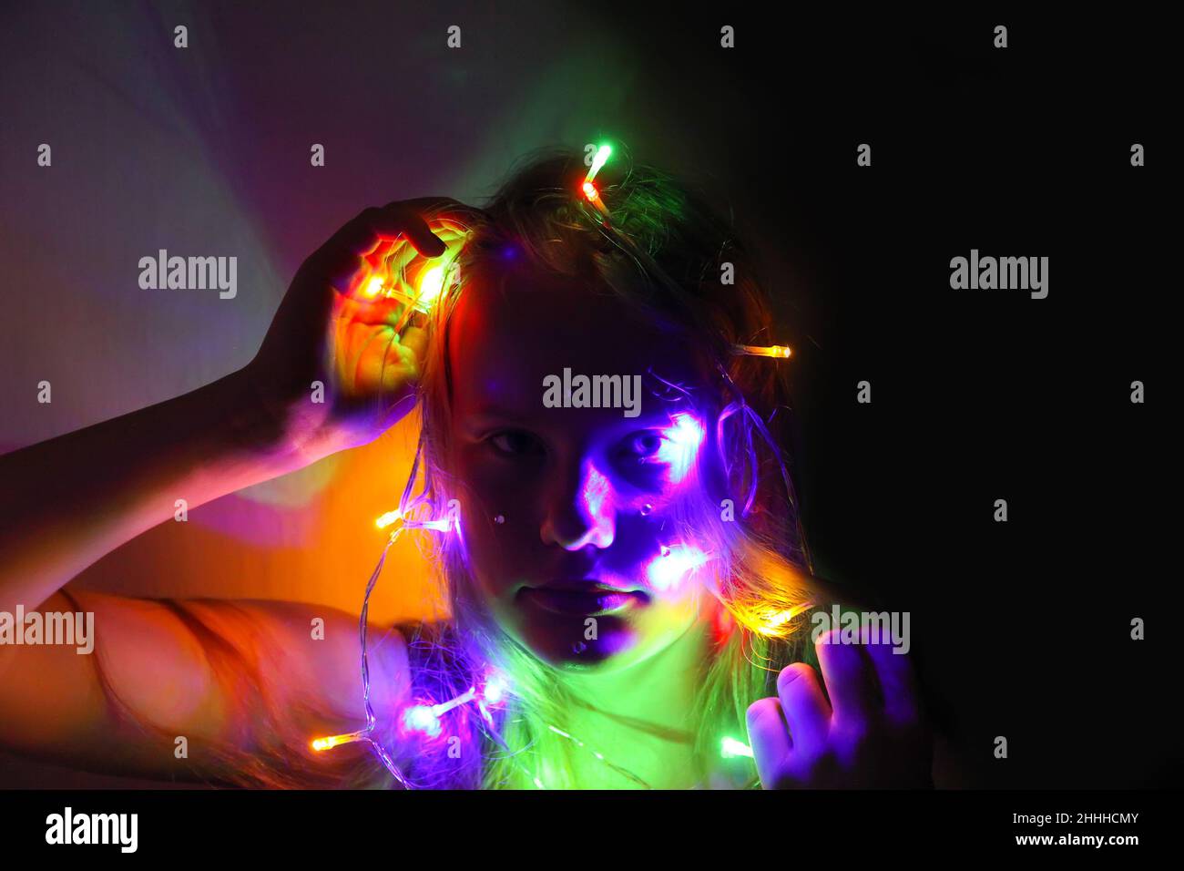 Pretty girl with garland on her hair Stock Photo - Alamy