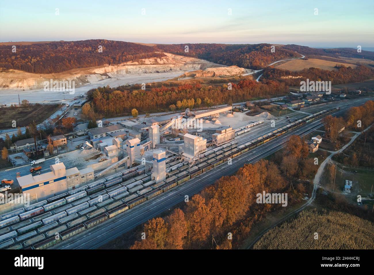 Aerial view of cargo train loaded with crushed stone materials at ...