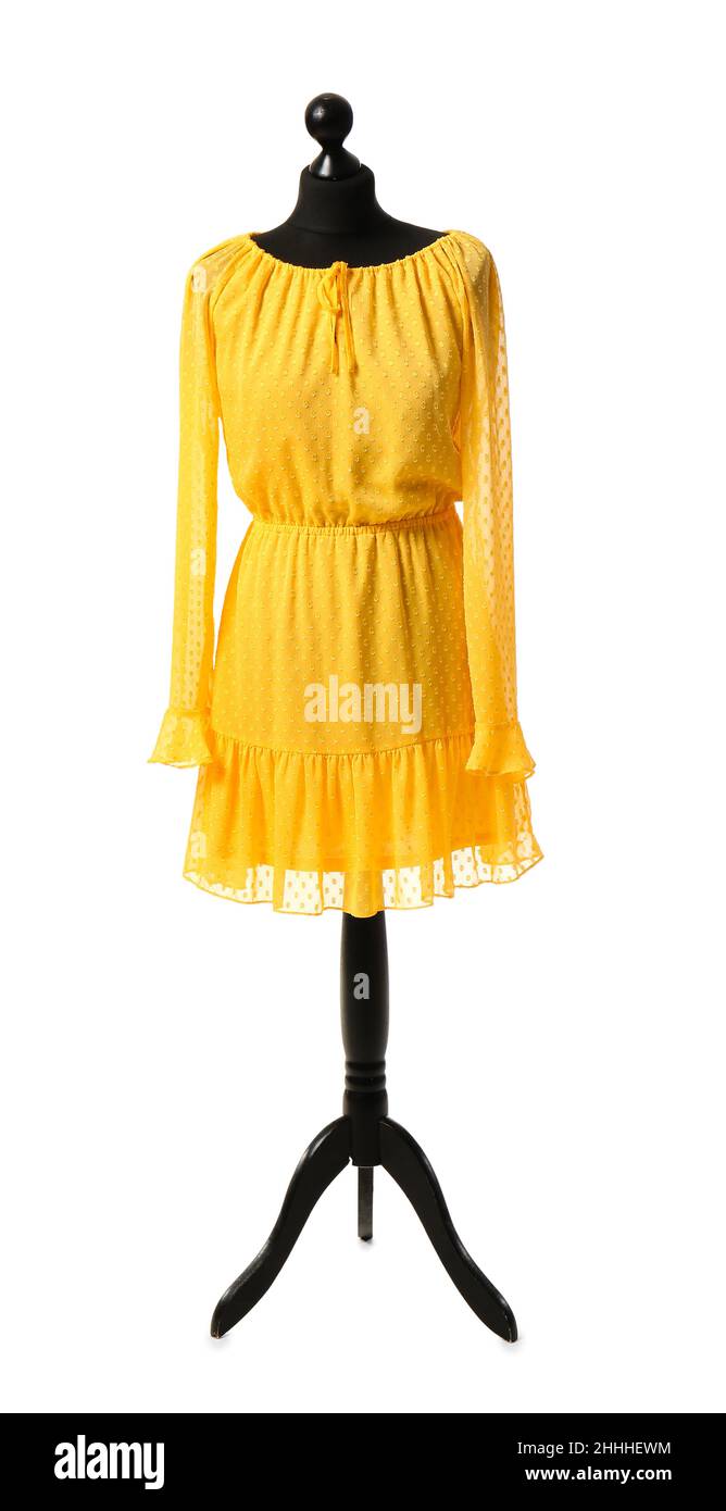 Mannequin with stylish yellow dress on white background Stock Photo - Alamy