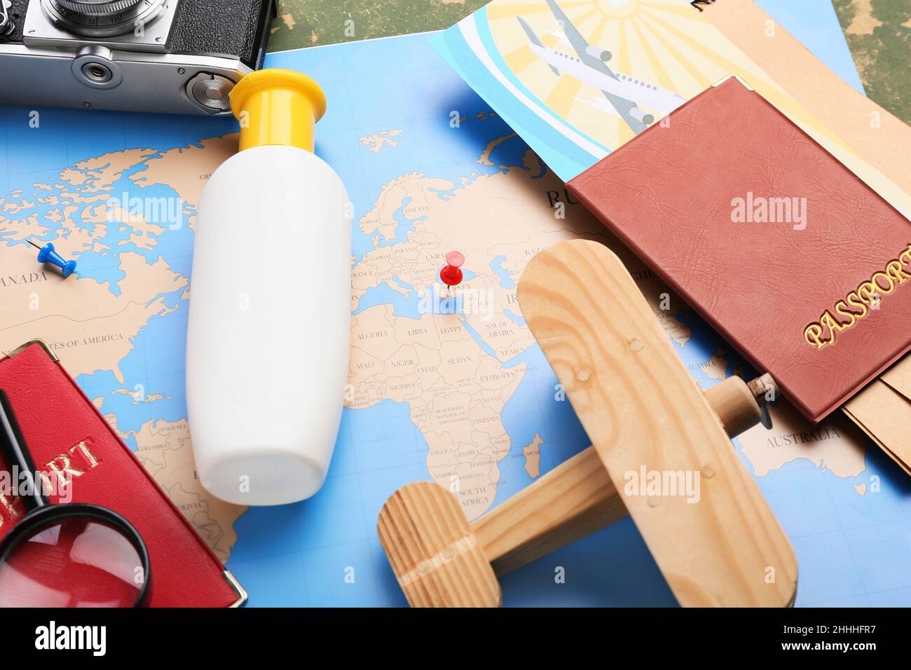 Passport airplane map magnifier hi-res stock photography and images - Alamy