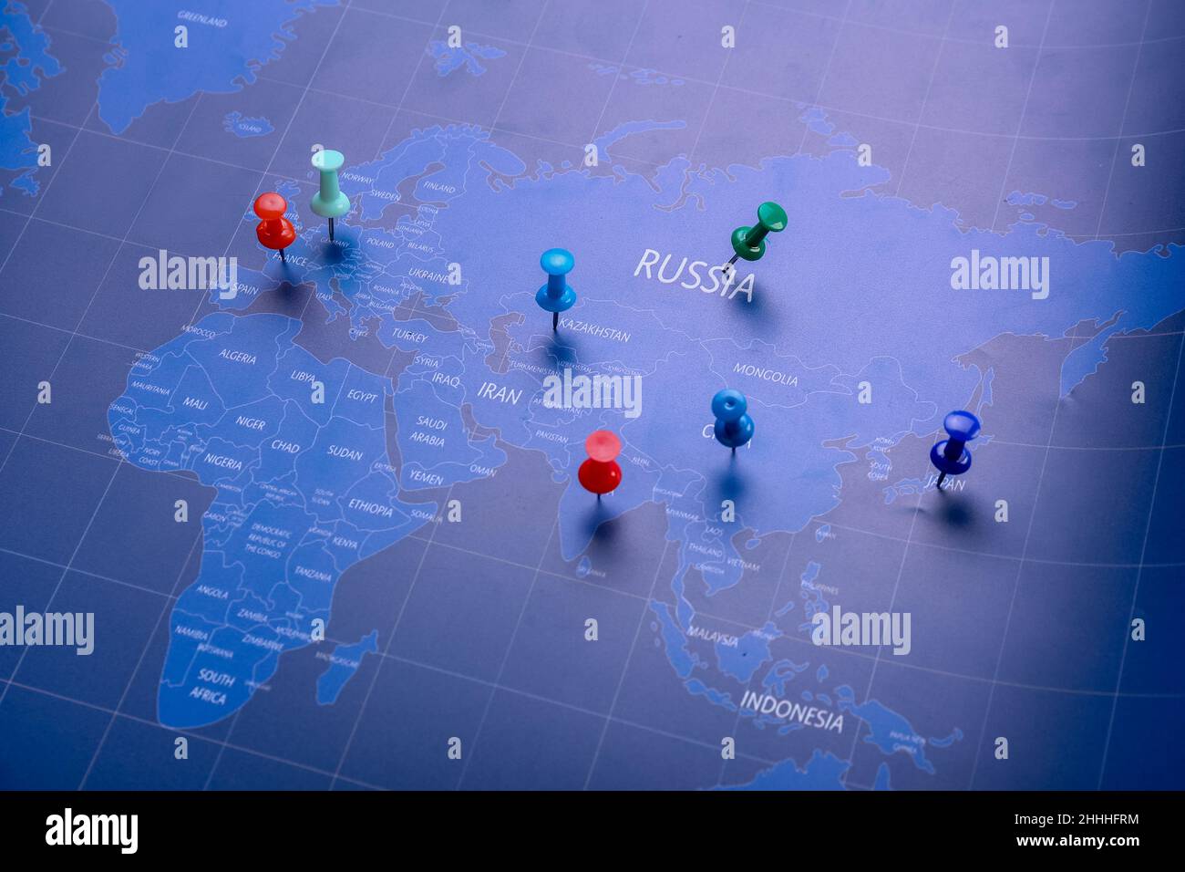 Different pins on world map Stock Photo - Alamy