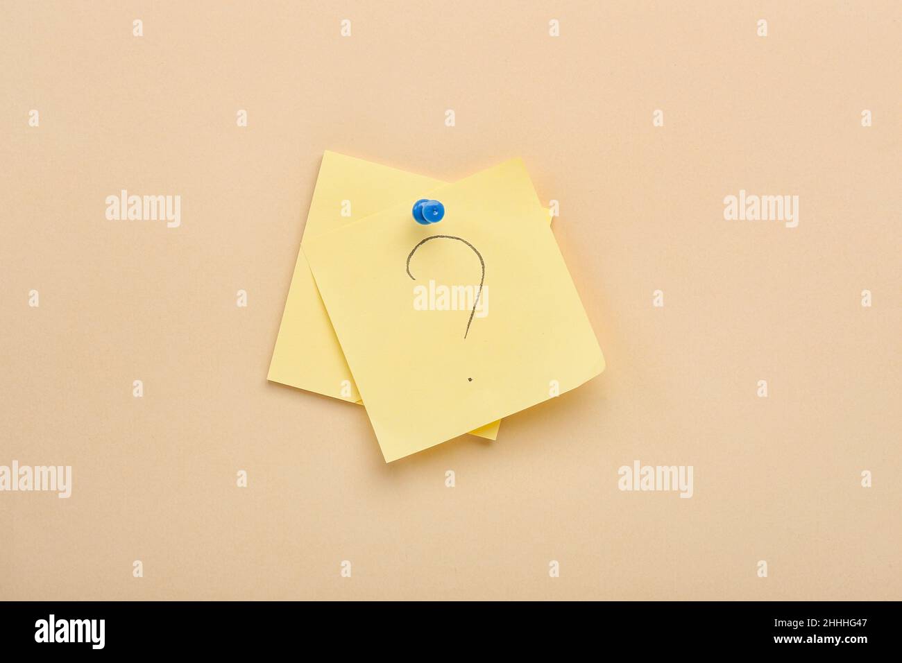 Paper stick with question mark on beige background Stock Photo - Alamy